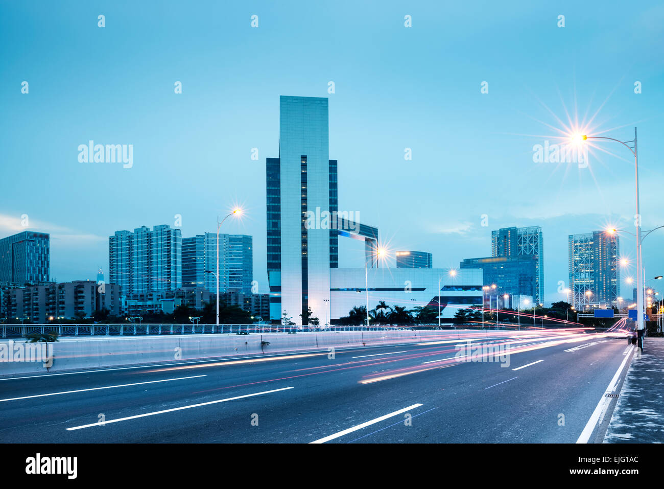the light trails on the modern building background in shanghai china ...