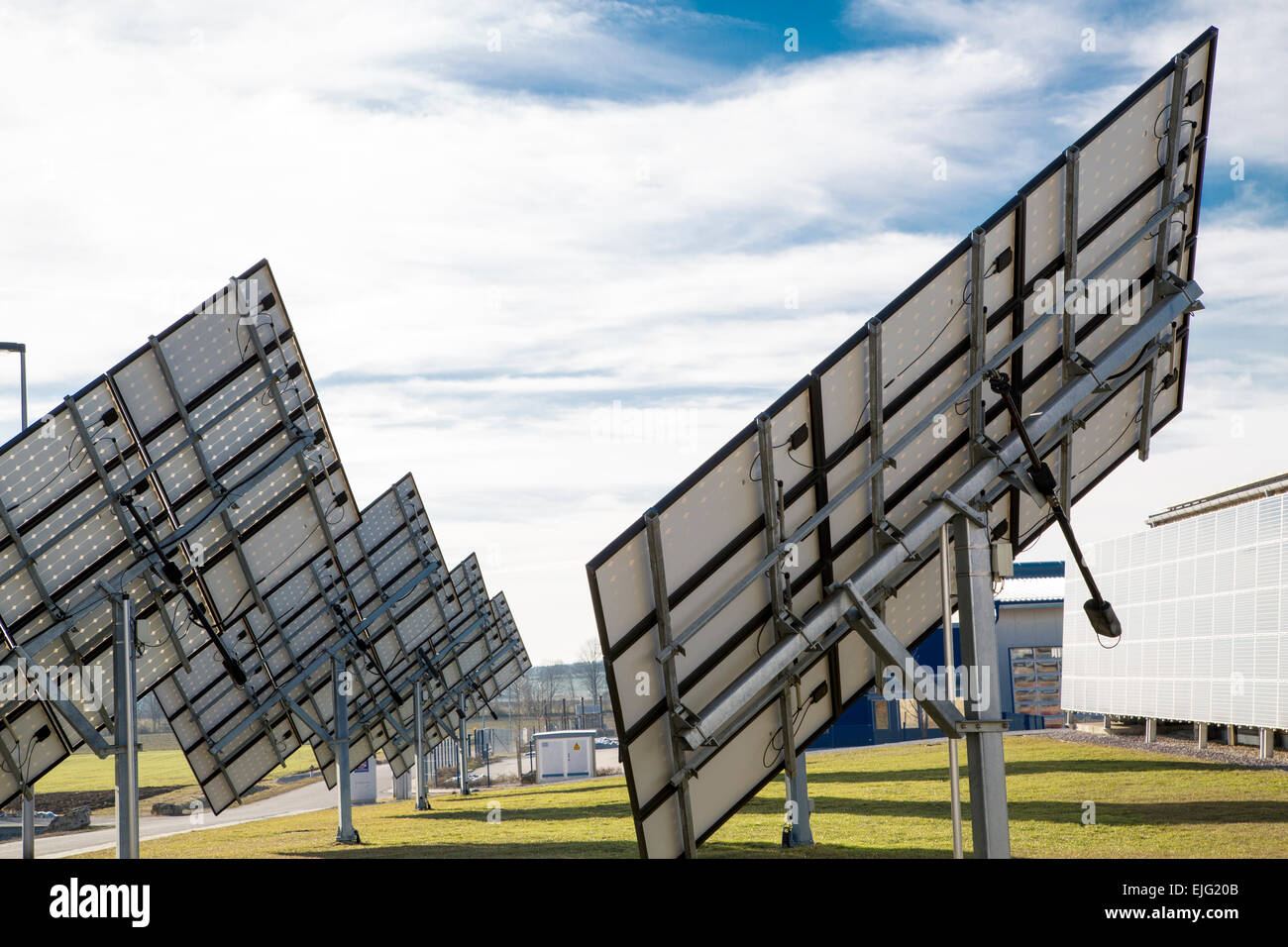 Back side of a row solar panels Stock Photo - Alamy