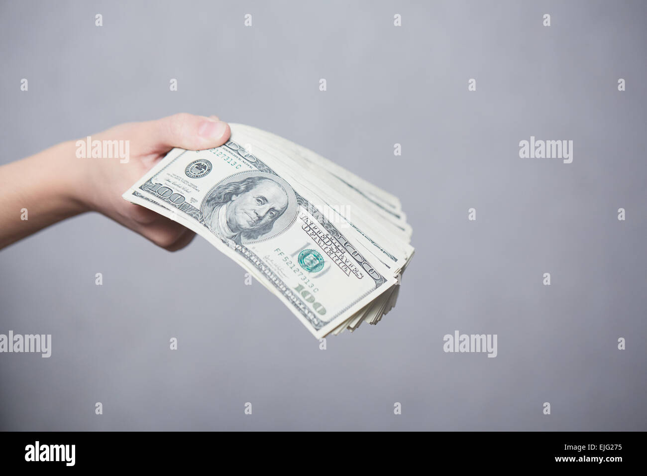 Money in female hands Stock Photo - Alamy
