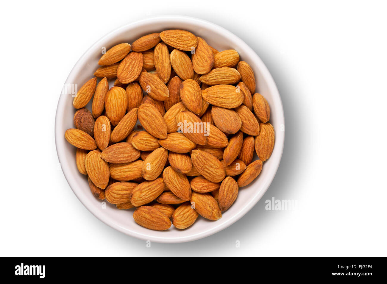 Almonds in a dish top view Stock Photo - Alamy