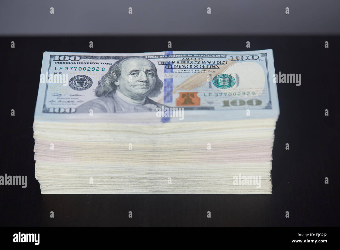 stacks of money Stock Photo - Alamy