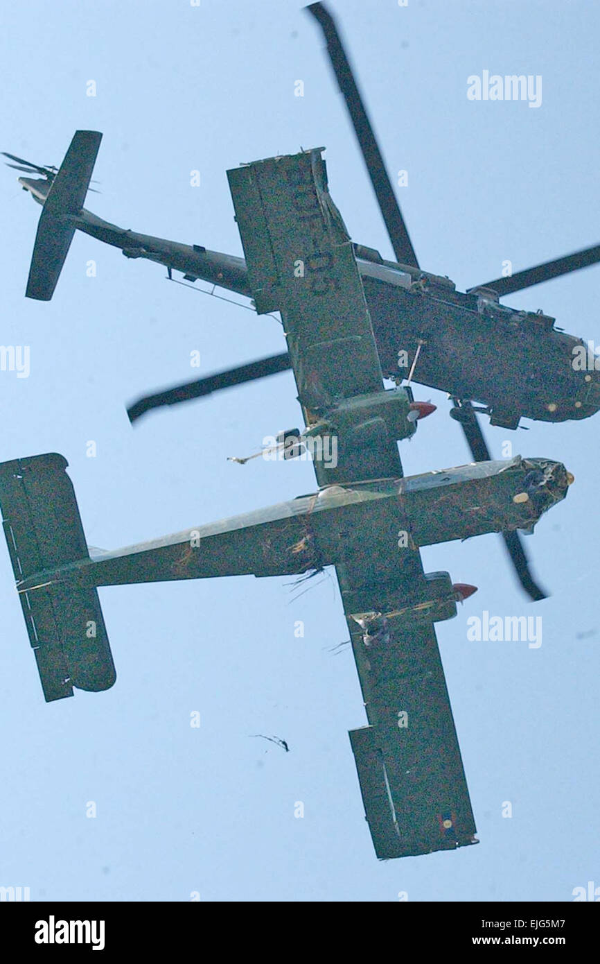 A U.S. Army UH-60 Black Hawk carries a Belize Defence Force BN-2B ...