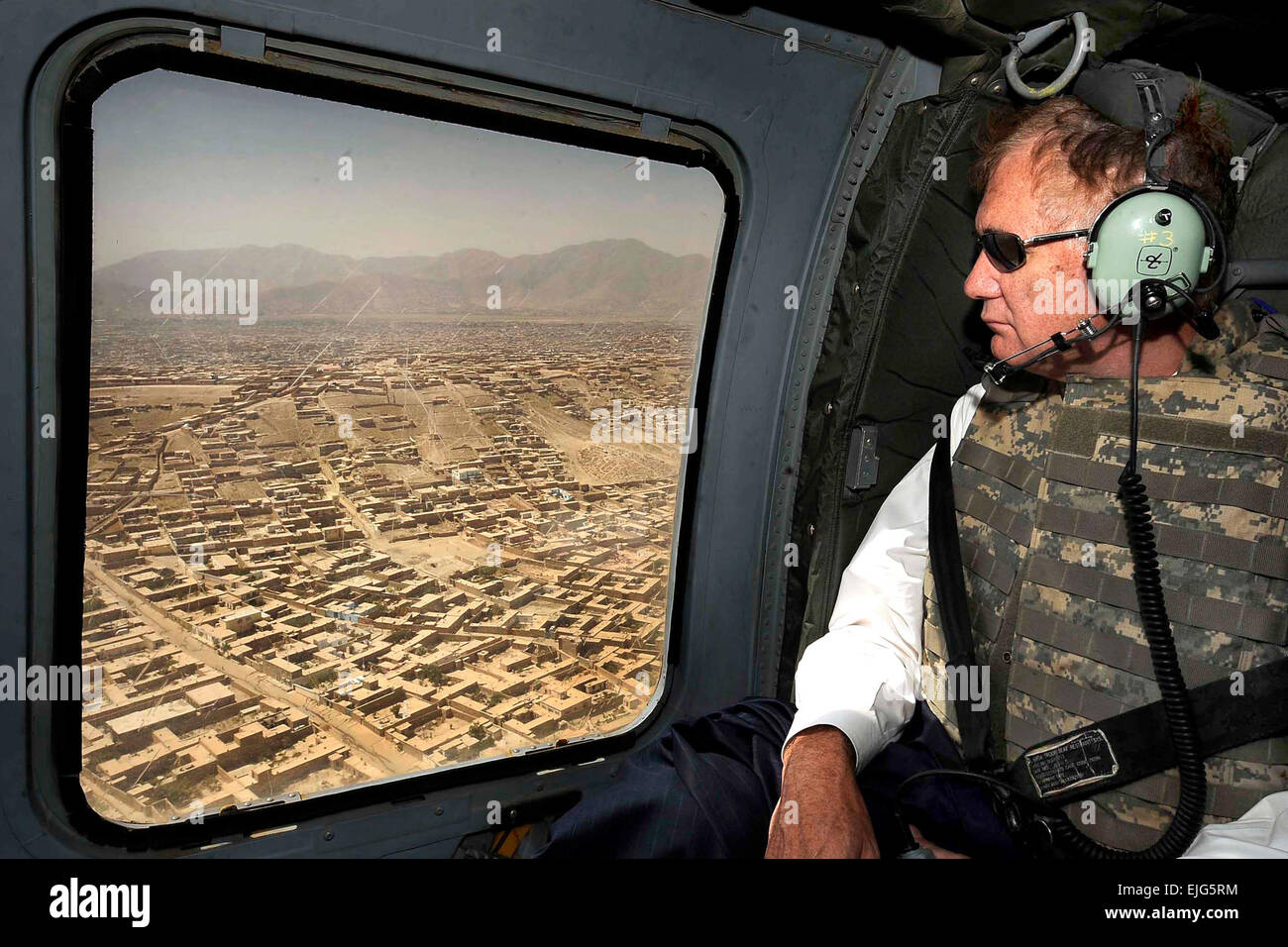 U.S. Deputy Defense Secretary William J. Lynn III looks at homes and ...