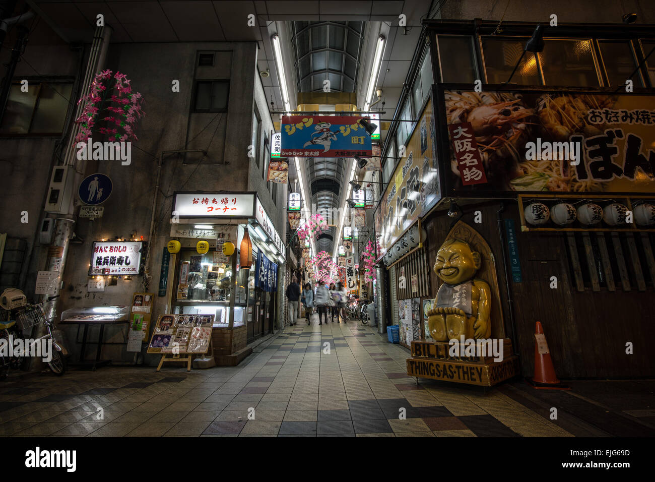 Night view of an old arcade in the Shinsekai area of Osaka, Japan. The ...