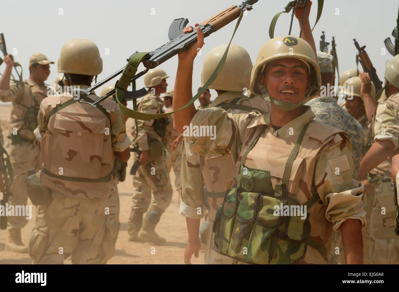 Iraqi army soldiers assigned to 17th IA Division celebrate completing ...