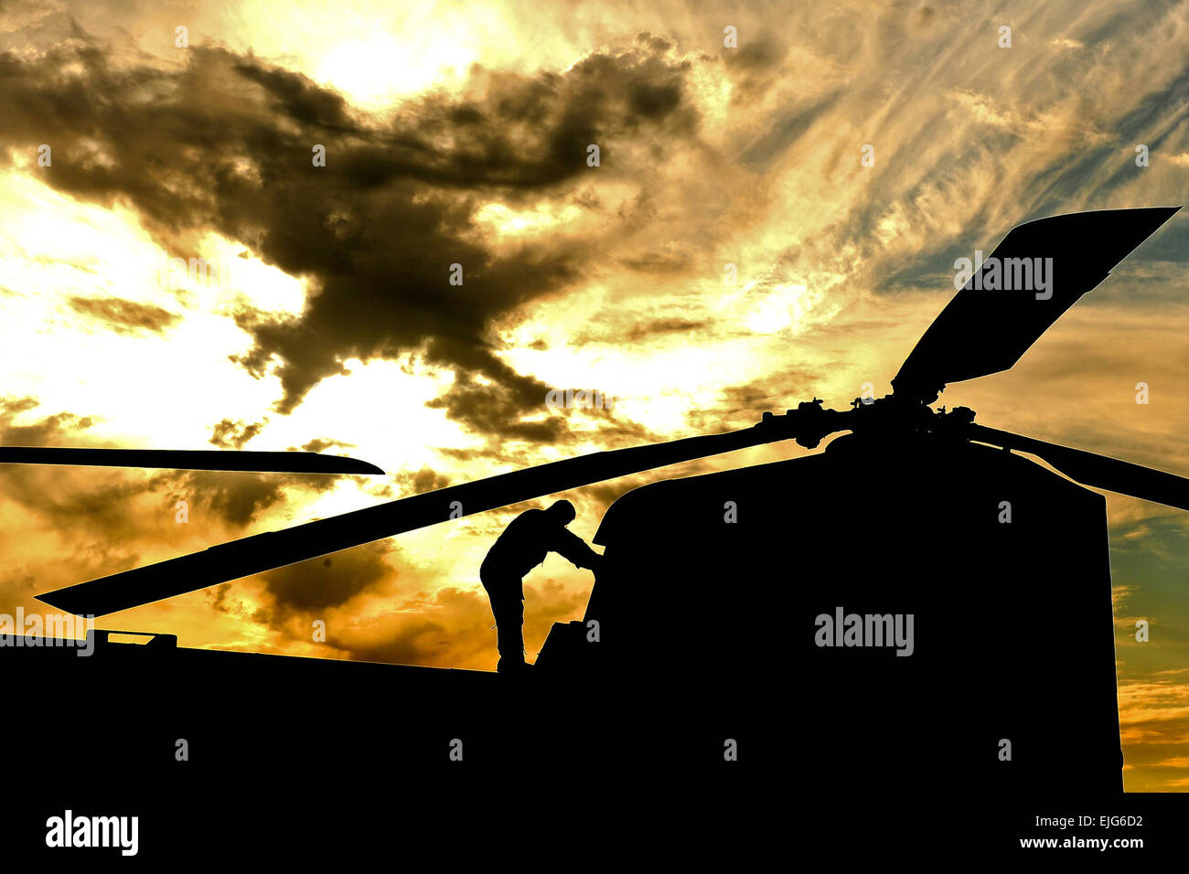 A U.S. Army CH-47 Chinook helicopter crew chief prepares to conduct a ...