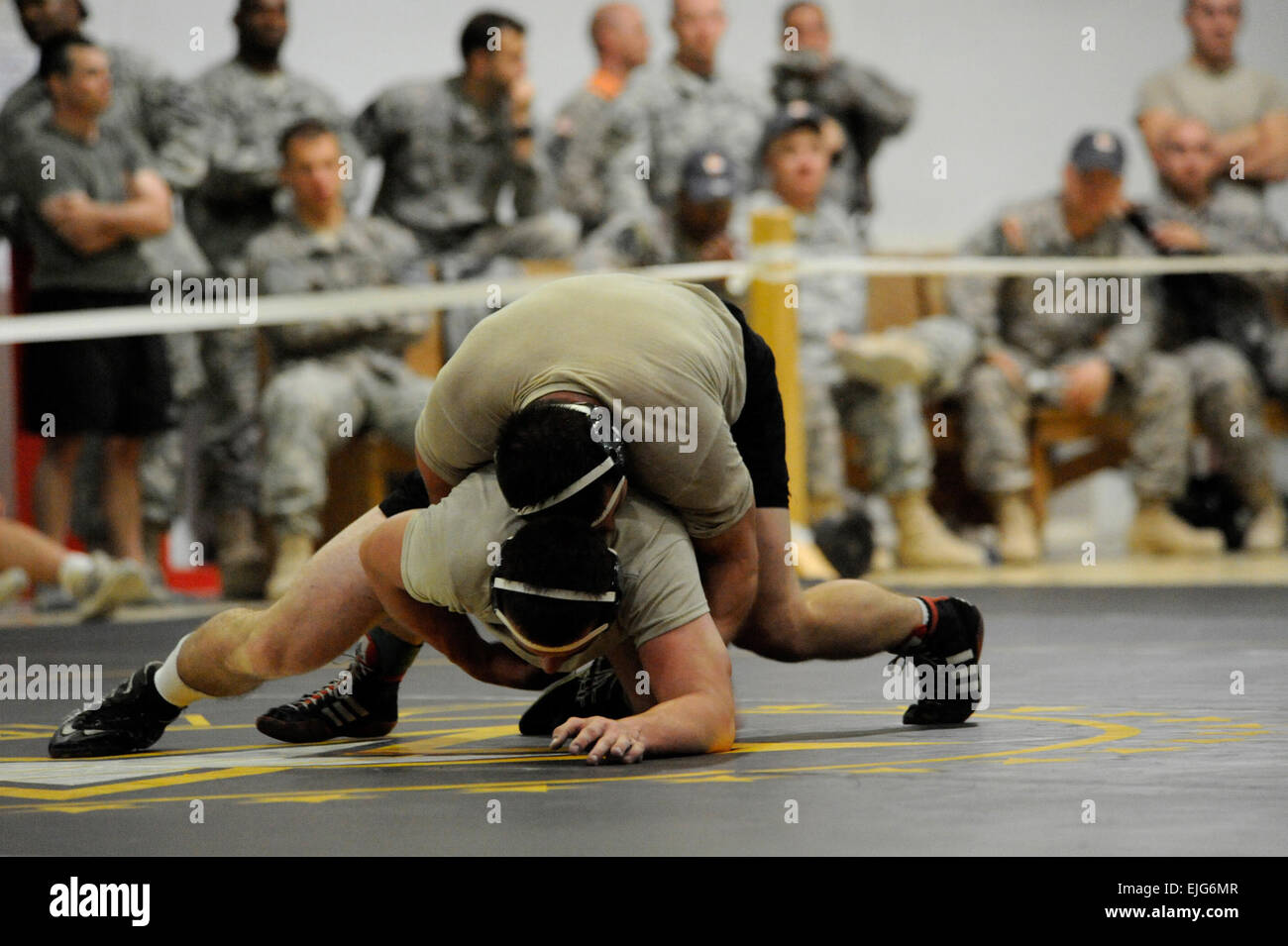 U.S. Army Soldiers compete in a collegiate wrestling tournament at ...