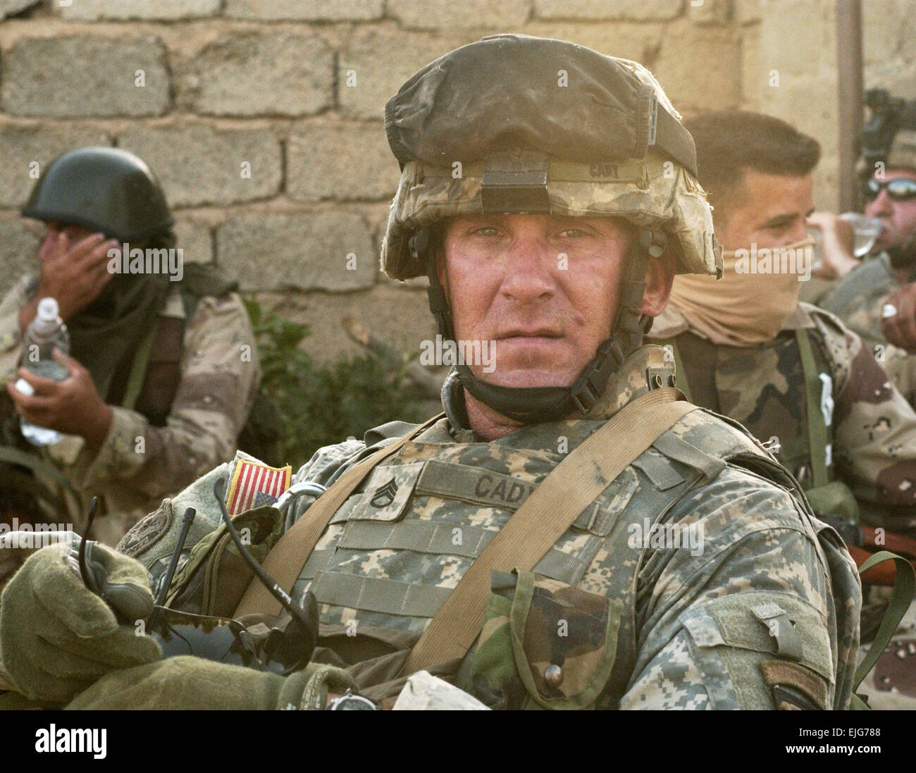 US Soldiers from the 1-32 CAV check their positions and take a break ...