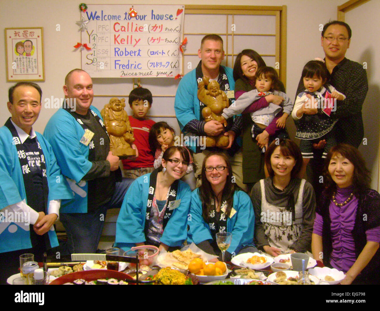42nd Infantry Division Soldiers pose with the Ikedas, a family they ...