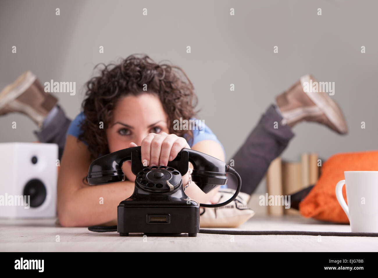 girl answering phone in a rush or dead set on calling someone Stock ...