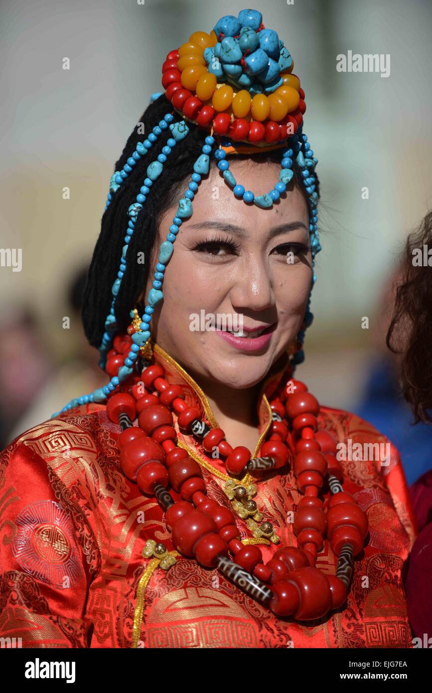 Qamdo. 26th Mar, 2015. Photo taken on March 26, 2015 shows a woman ...