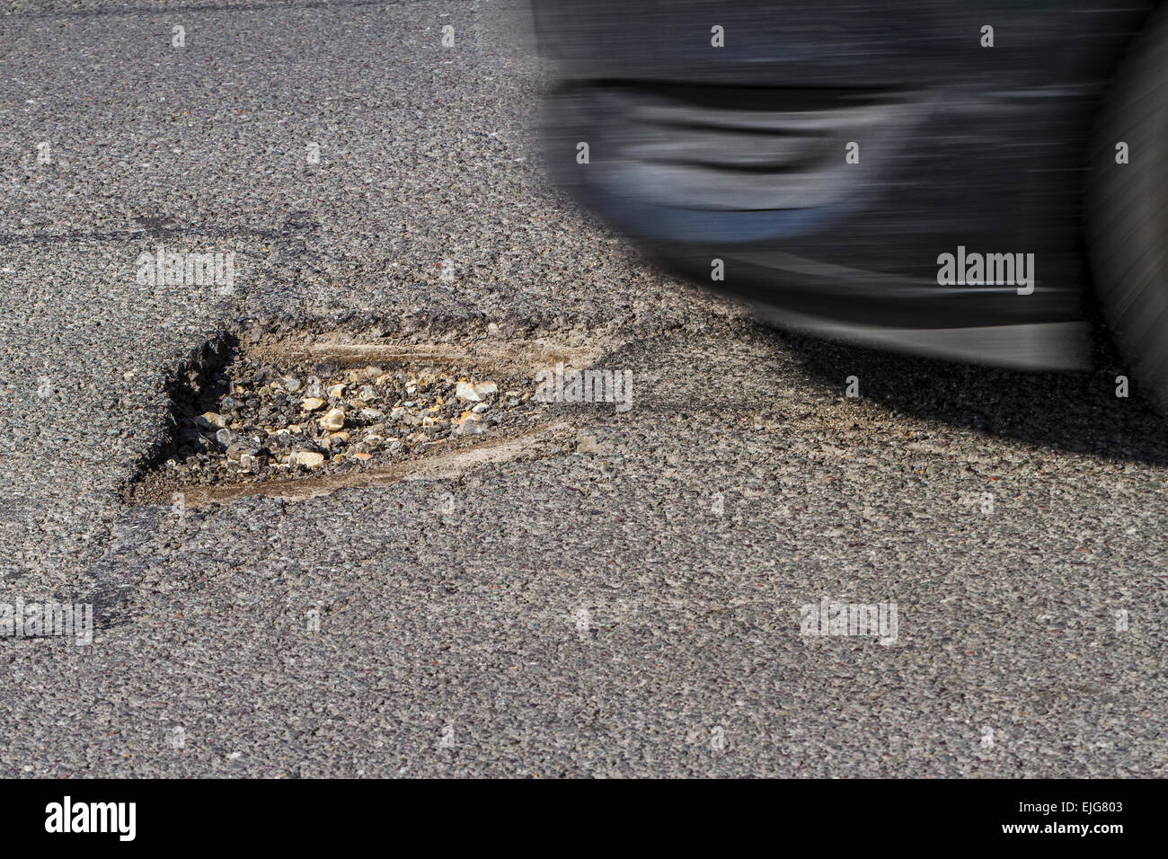 Pothole car hi-res stock photography and images - Alamy