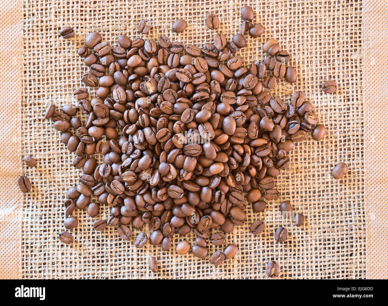 Coffee beans on tissue mat Stock Photo - Alamy