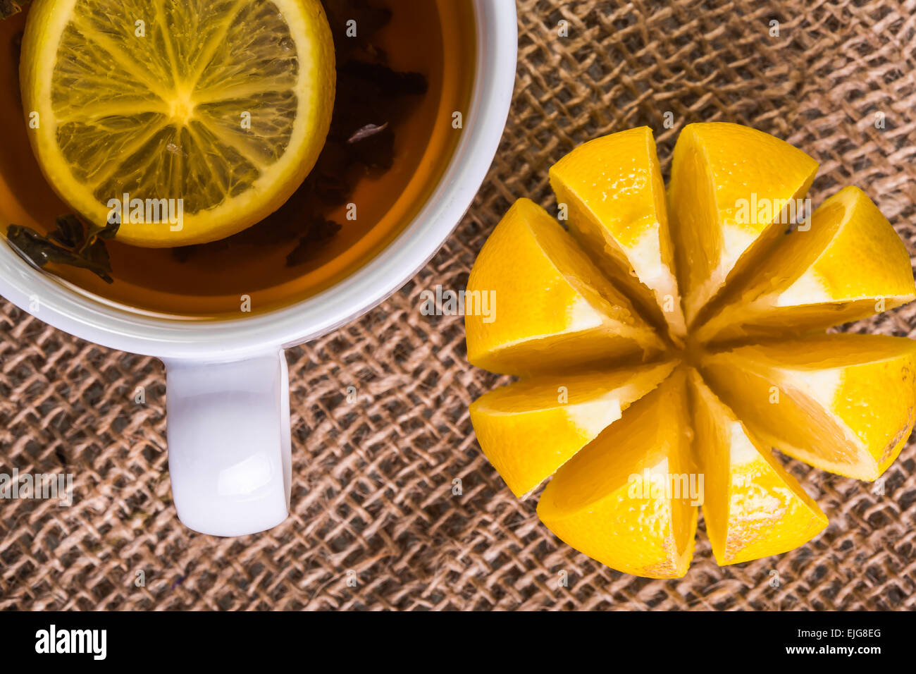 cup of tea with lemon closeup on a vintage background Stock Photo - Alamy