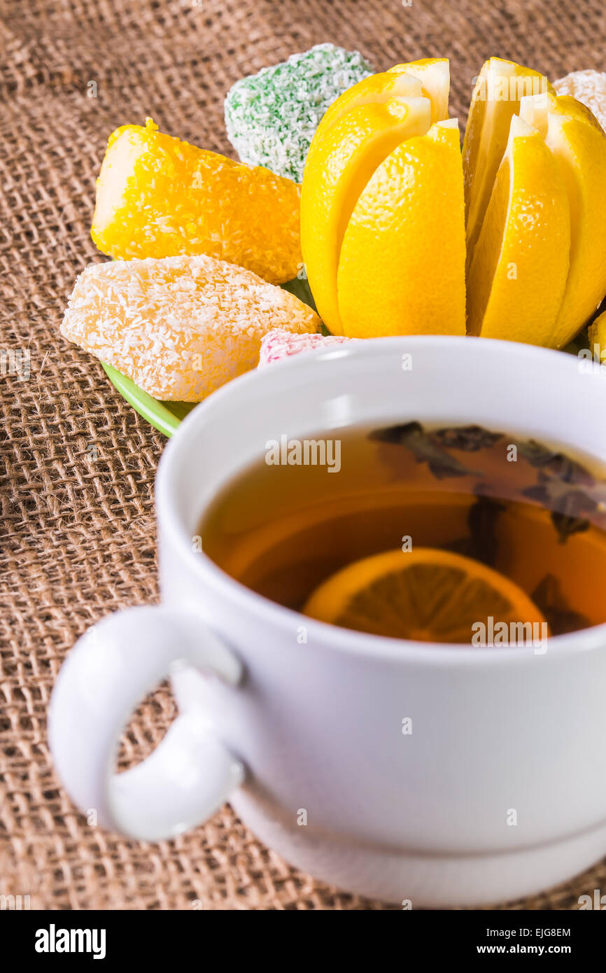 cup of green tea with lemon close-up on a vintage background Stock ...