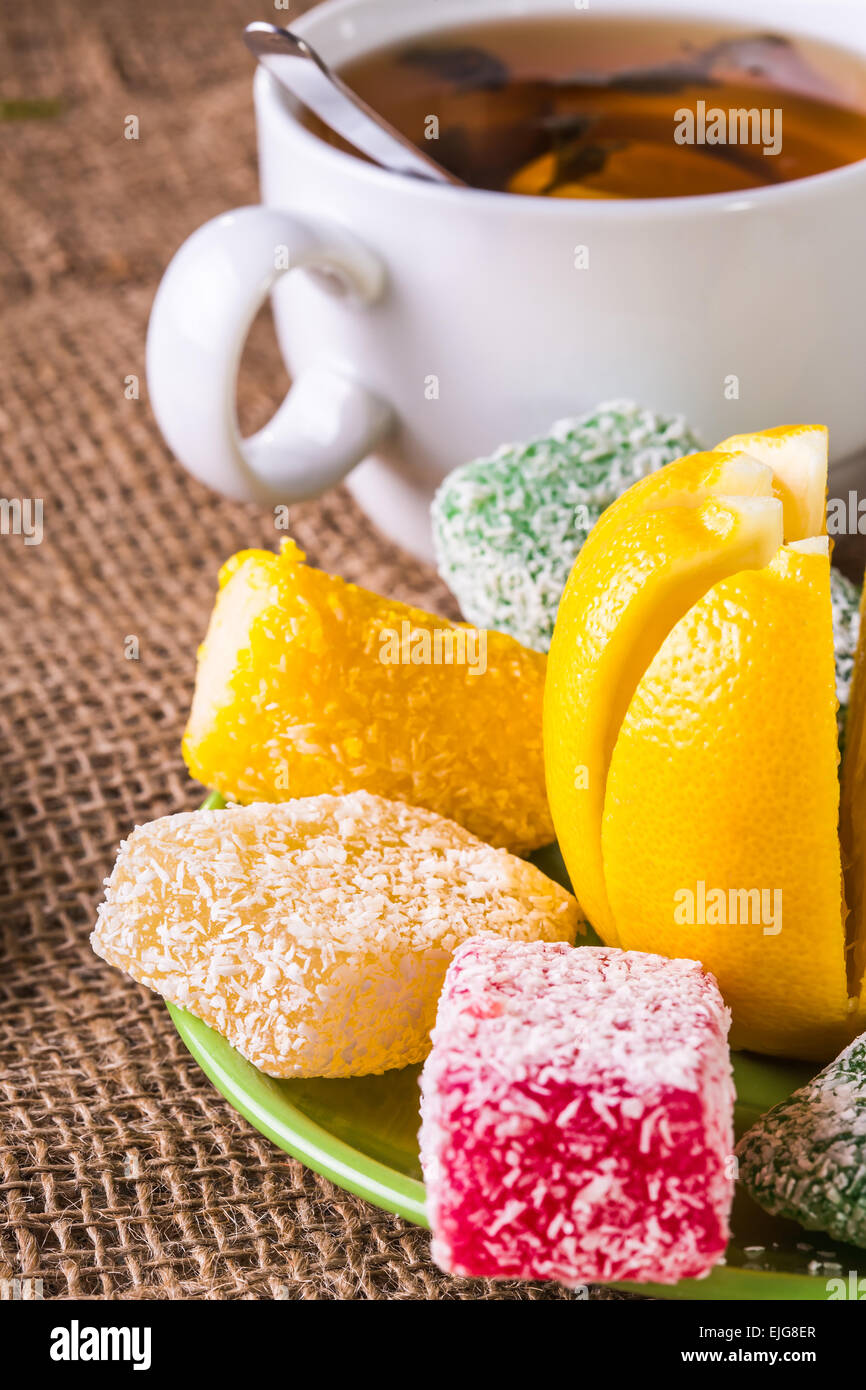 cup of green tea with lemon on a vintage background Stock Photo - Alamy