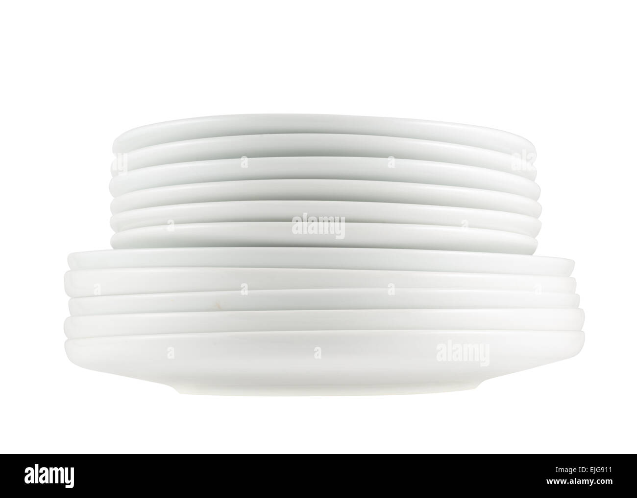 Pile of clean white dish plates isolated Stock Photo - Alamy