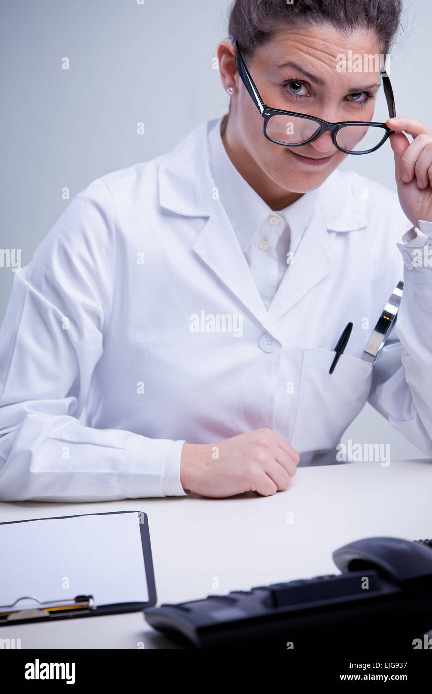 distrustful look of a doctor staring at you with some reproach Stock ...