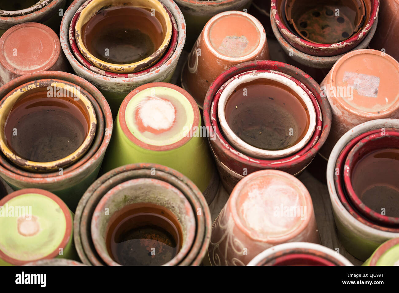 old empty flower pots lying in a heap Stock Photo - Alamy