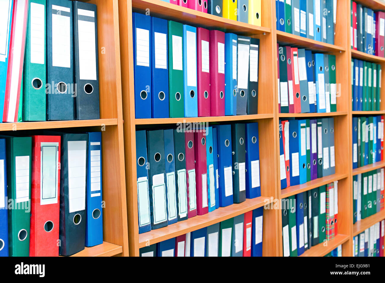 file folders, standing on the shelves in the background Stock Photo - Alamy