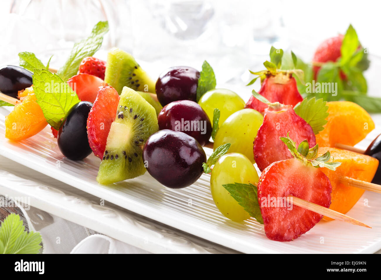 Fruits on sticks Stock Photo - Alamy