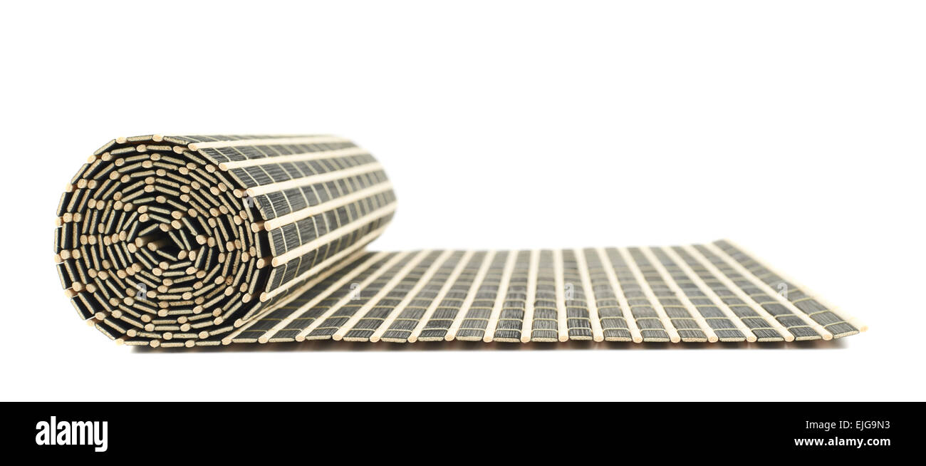 Rolled straw mat isolated Stock Photo - Alamy