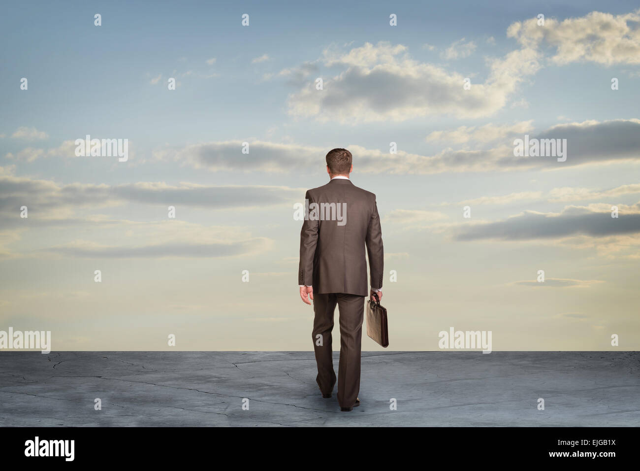 Concrete fissures surface. Man standing back. Sunset Stock Photo - Alamy