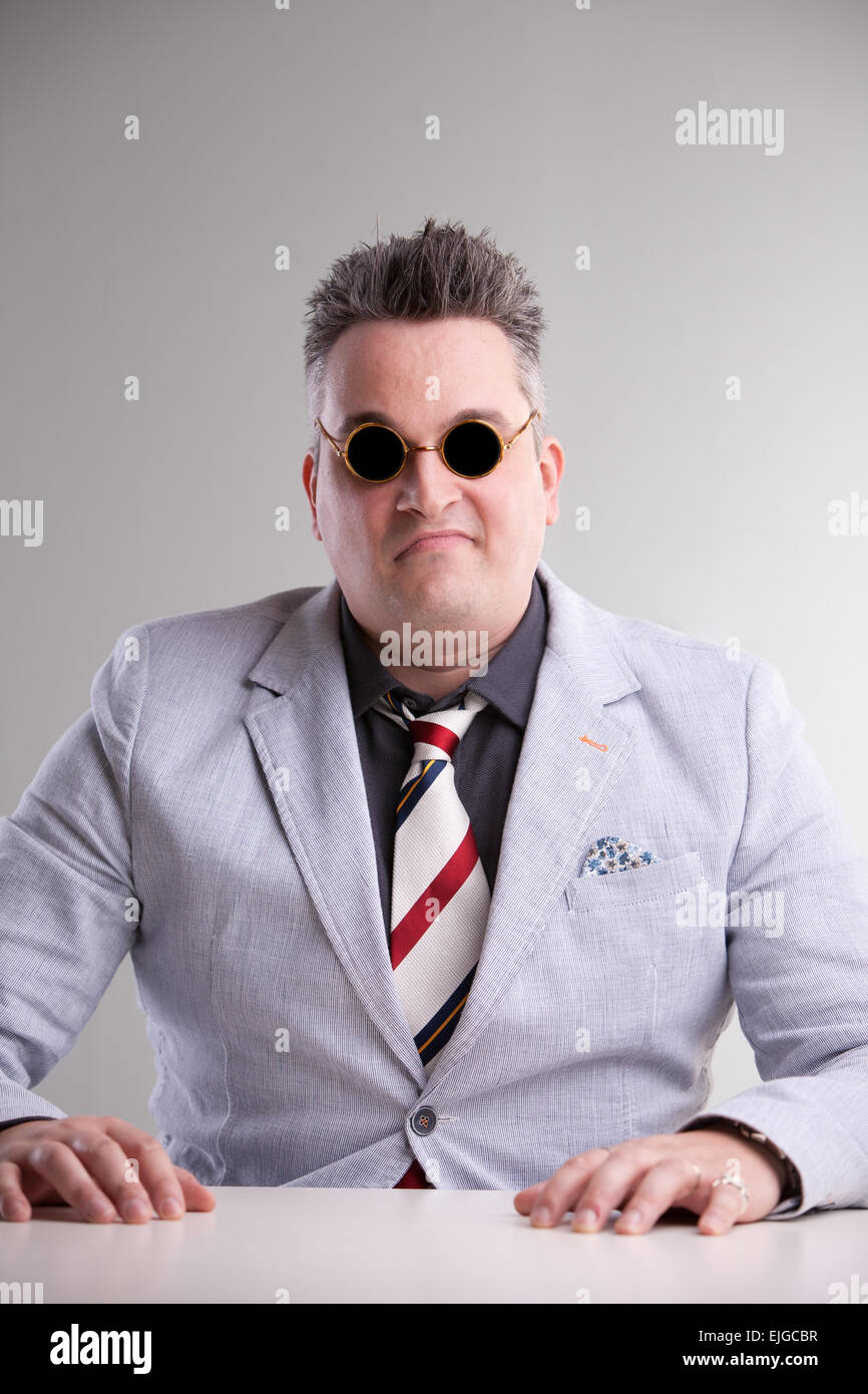 Plump Aggressive Bossy Businessman Waiting For You At His Desk Stock