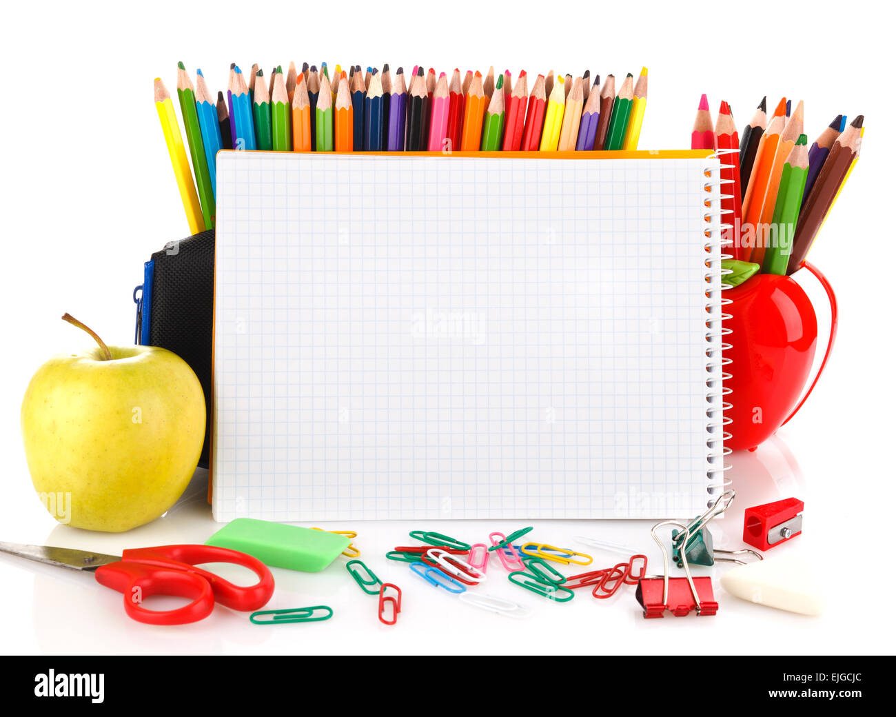Notebook with school stationary objects in the background, place for ...