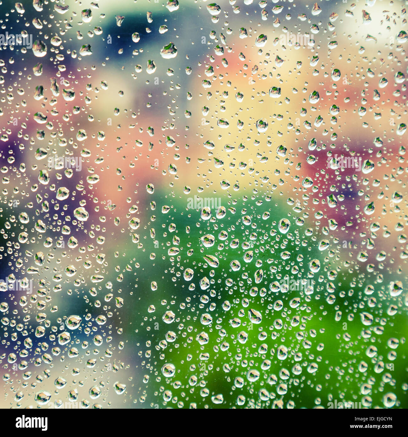 Wet glass with droplets, colorful square photo background with ...