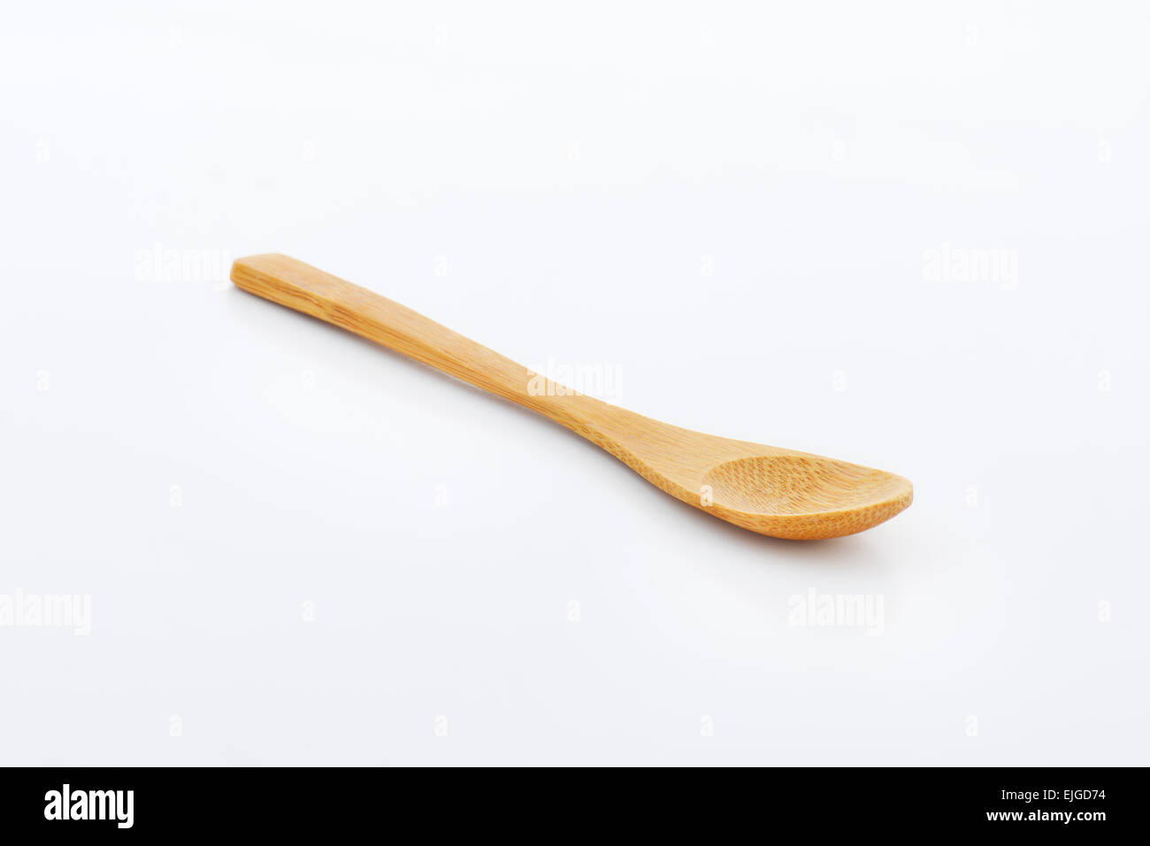 Small flat rustic wooden spoon Stock Photo - Alamy