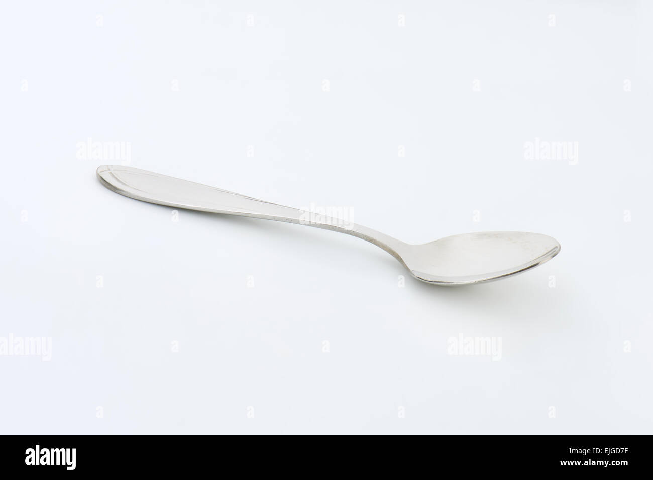 Empty classic metal table spoon Stock Photo - Alamy