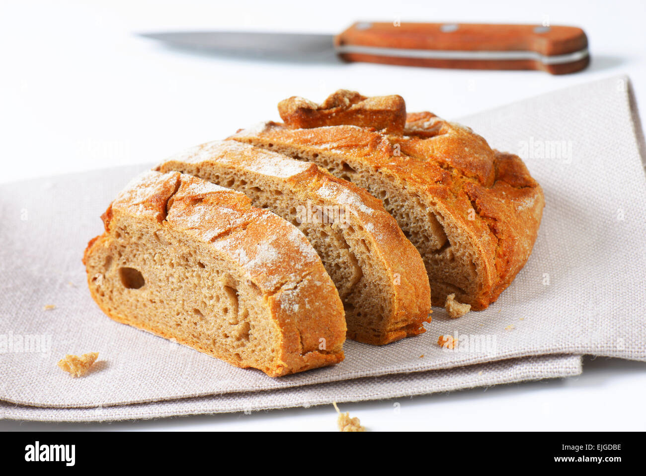 Sliced loaf of bread with crispy crust Stock Photo - Alamy