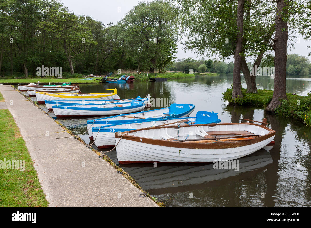 Group of rowing boats at Thorpeness boating lake Stock Photo - Alamy