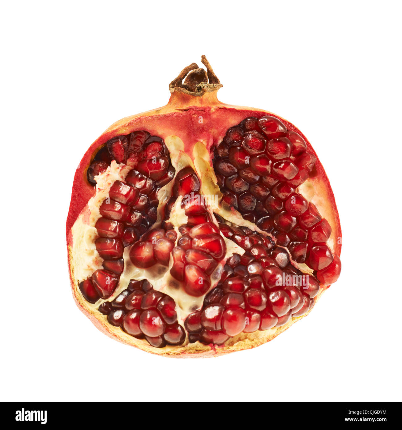 Sliced half of a pomegranate fruit Stock Photo - Alamy
