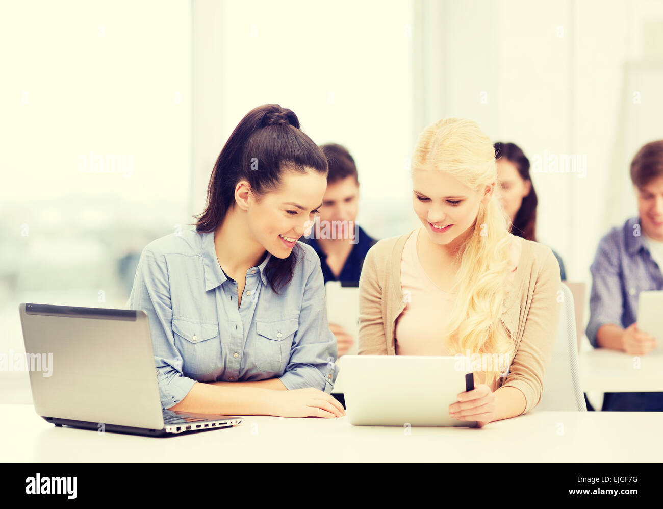 Two boys chatting laptop hi-res stock photography and images - Alamy