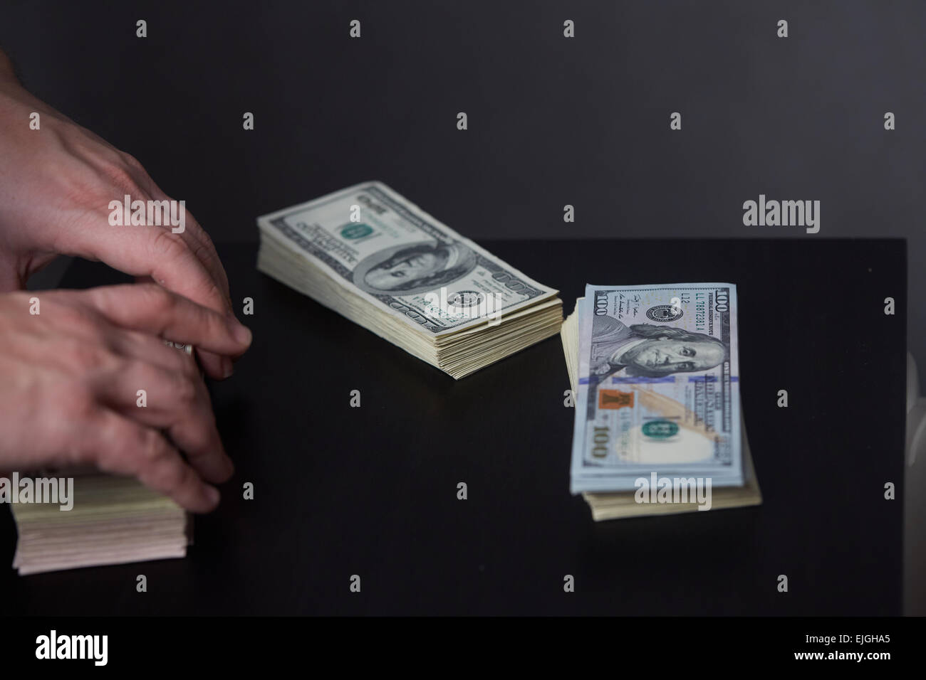 Hand puts dollar bill in hi-res stock photography and images - Alamy