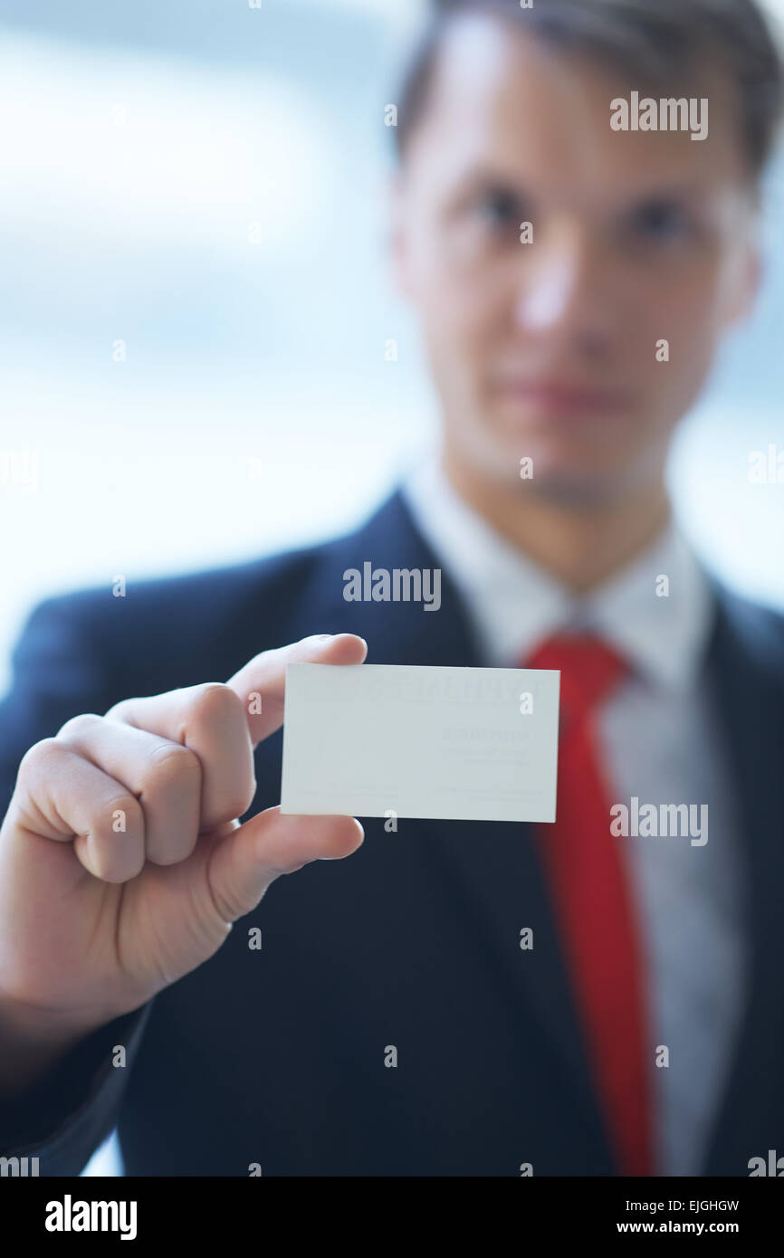 businessman giving a business card Stock Photo - Alamy