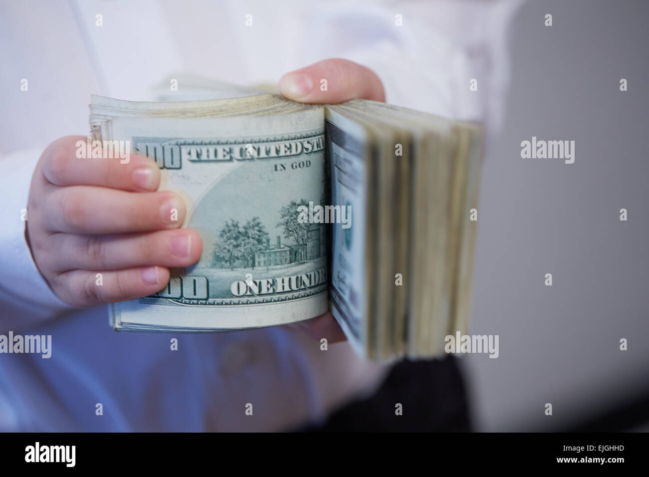 money in children's hands Stock Photo - Alamy