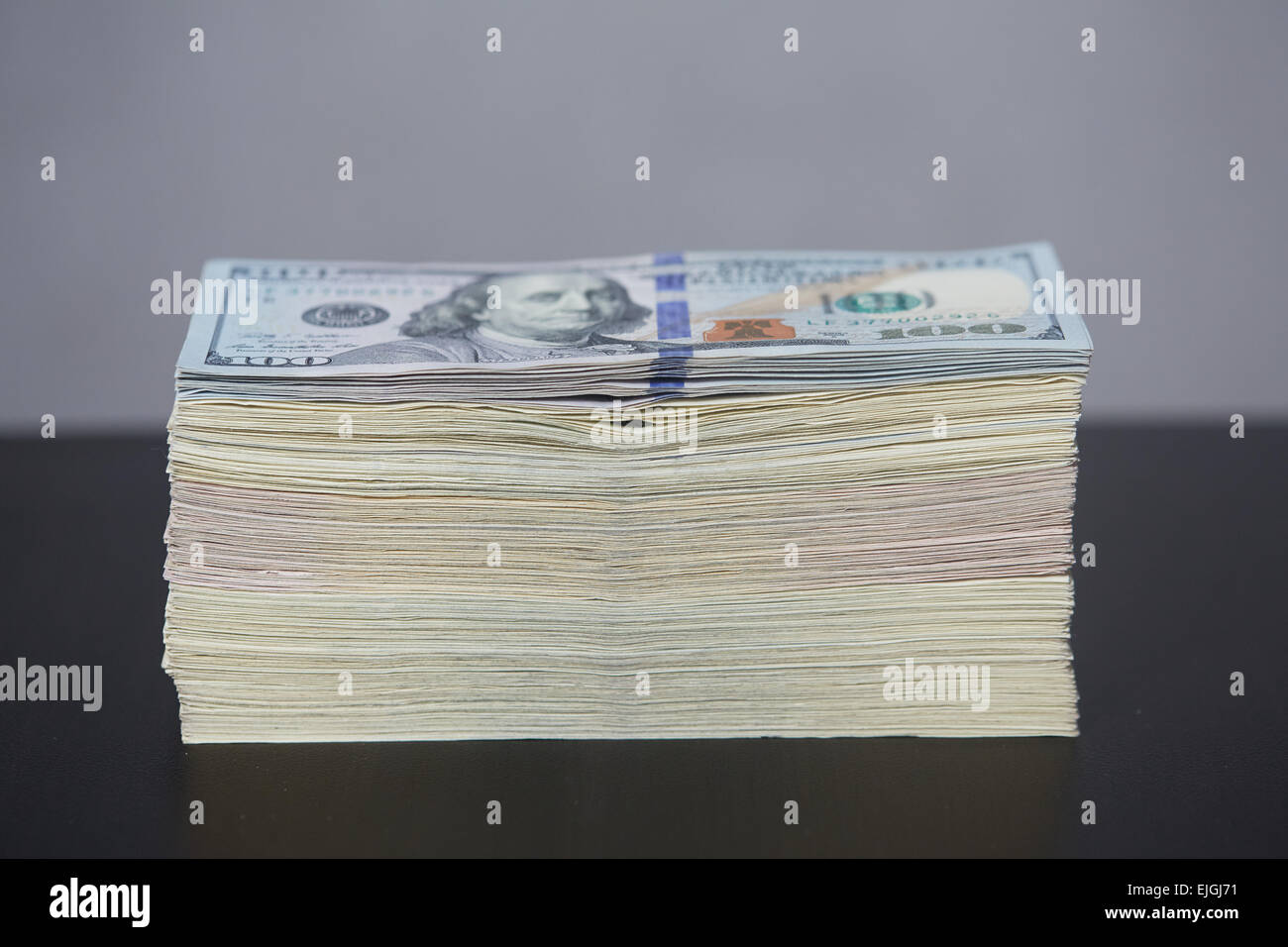 stacks of money Stock Photo - Alamy