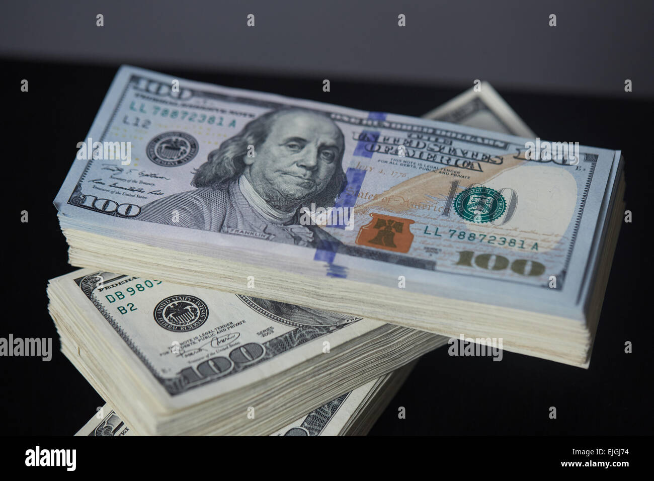 stack of money on the table Stock Photo - Alamy