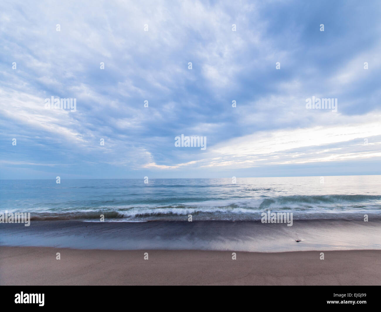 Sand beach dramatic clouds hi-res stock photography and images - Alamy