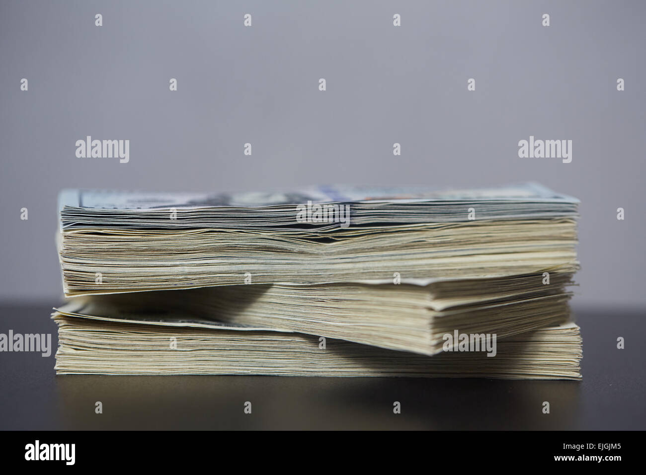 stacks of money Stock Photo - Alamy
