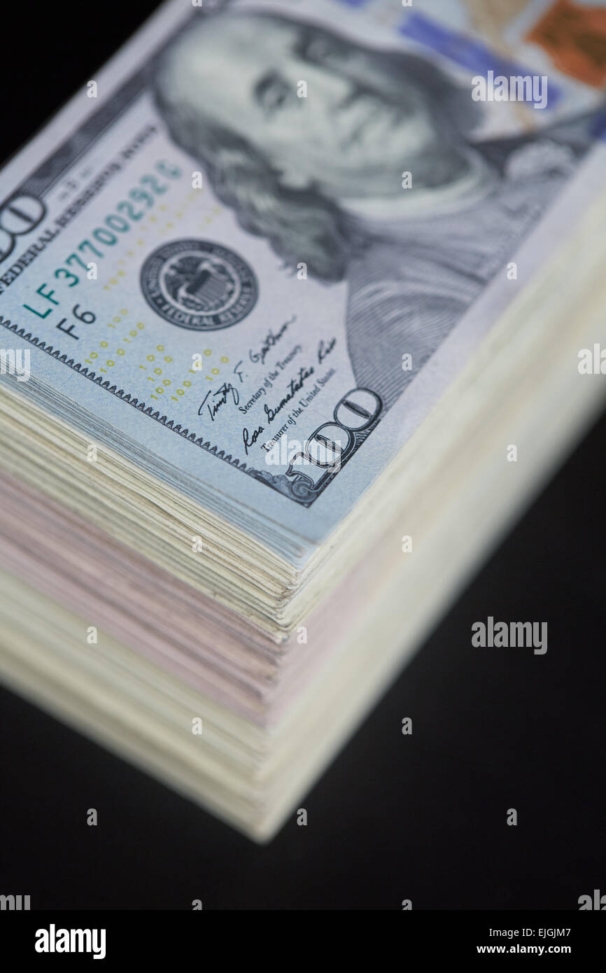stacks of money Stock Photo - Alamy