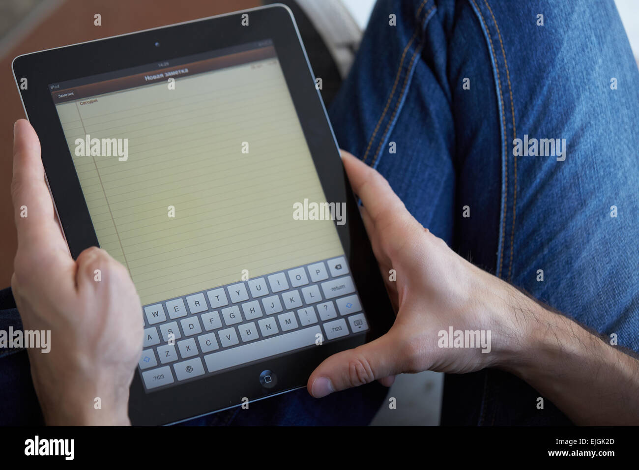 the tablet in hands Stock Photo - Alamy