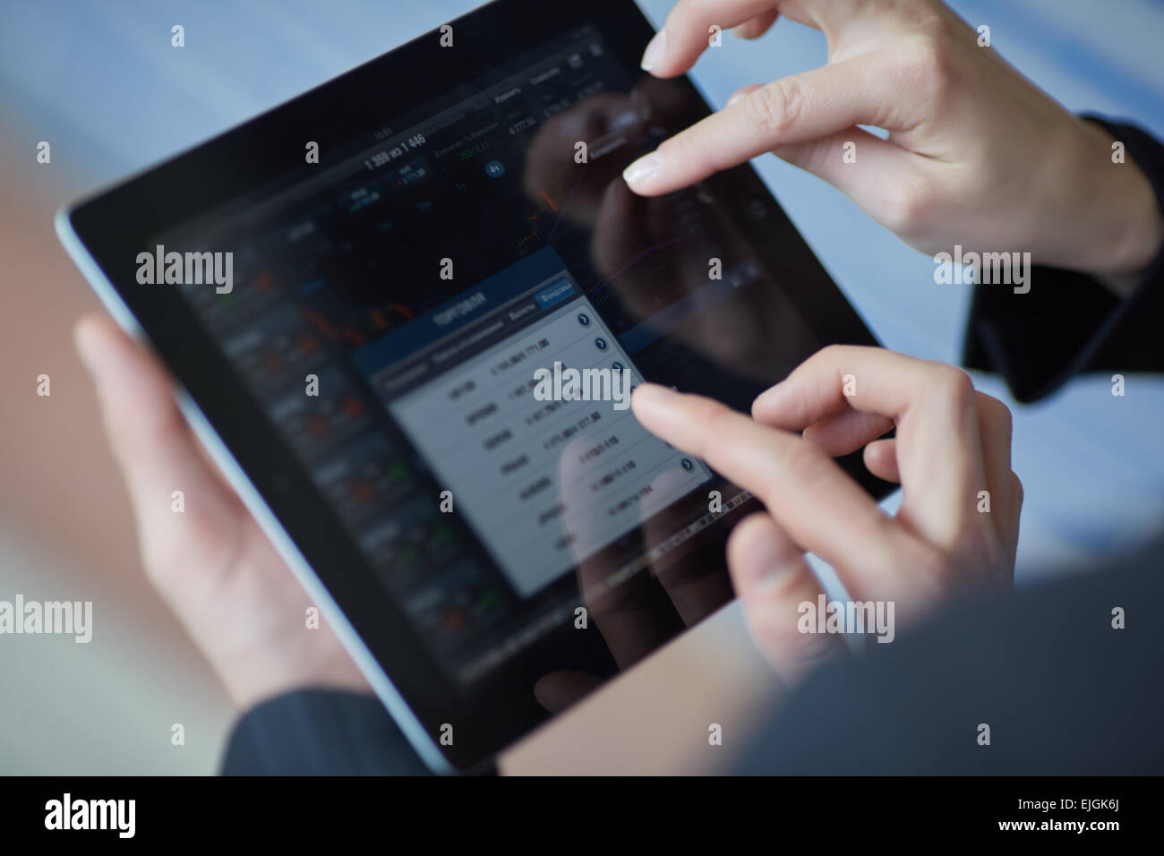 the tablet in hands Stock Photo - Alamy