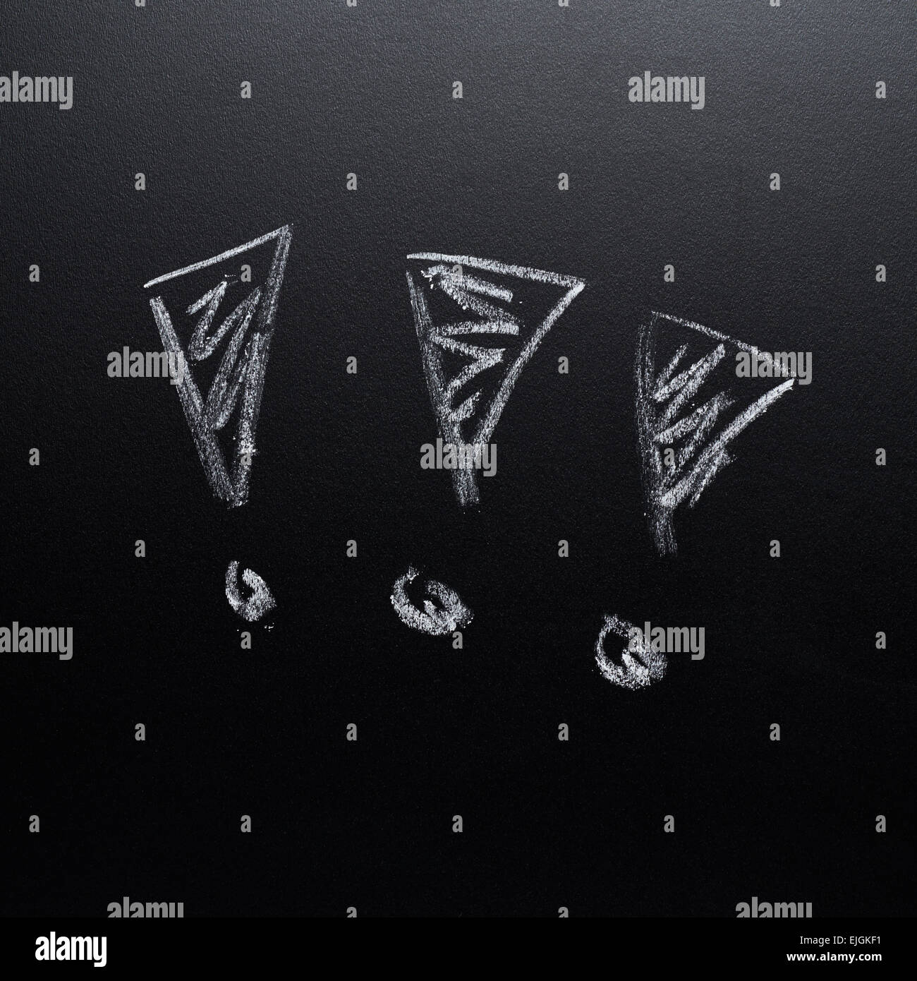 Three exclamation marks on the blackboard Stock Photo - Alamy