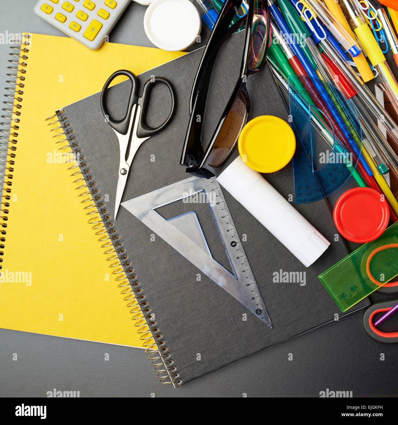 Desk covered with multiple stationery Stock Photo - Alamy