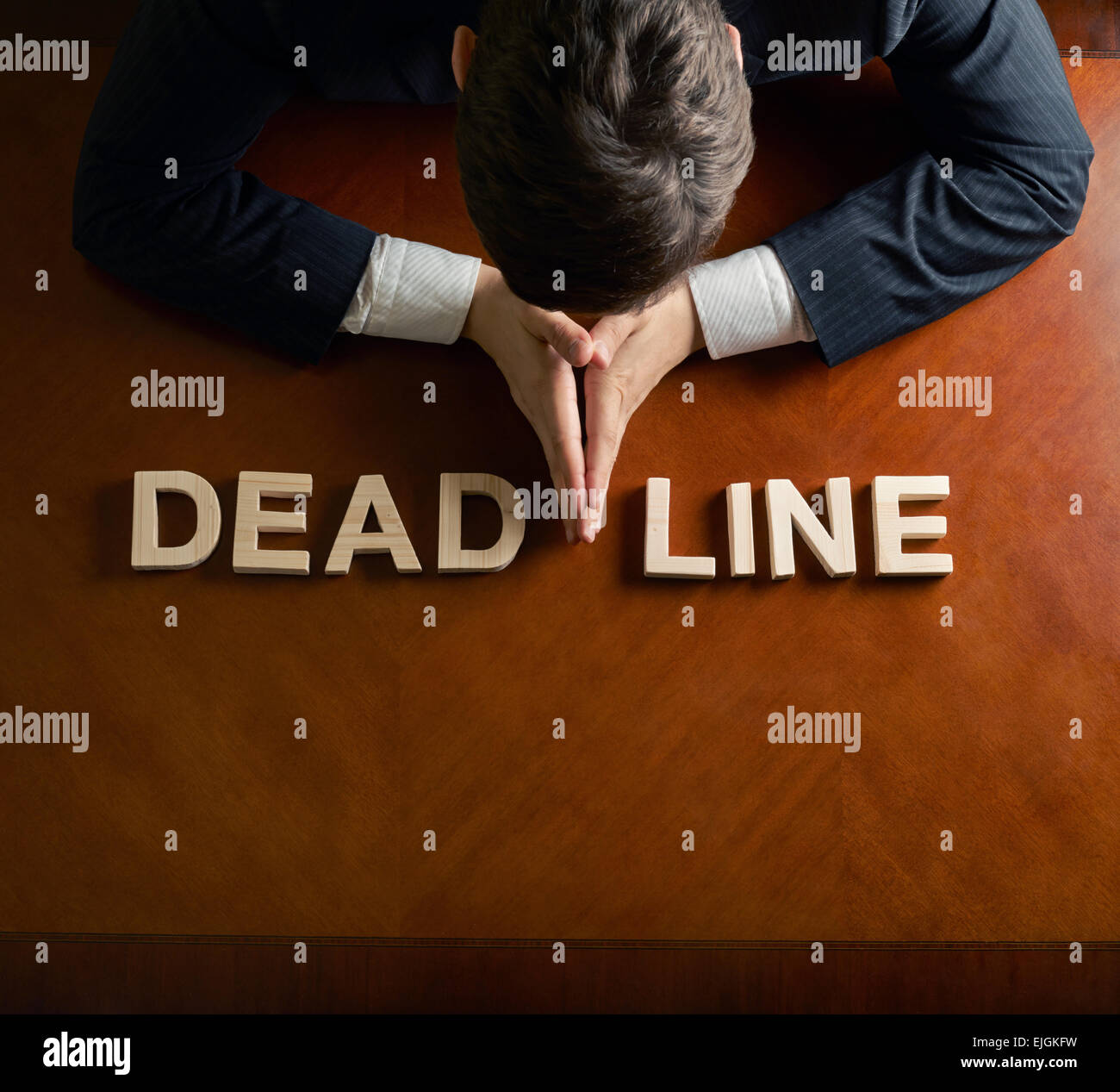 Word Deadline and devastated man composition Stock Photo - Alamy