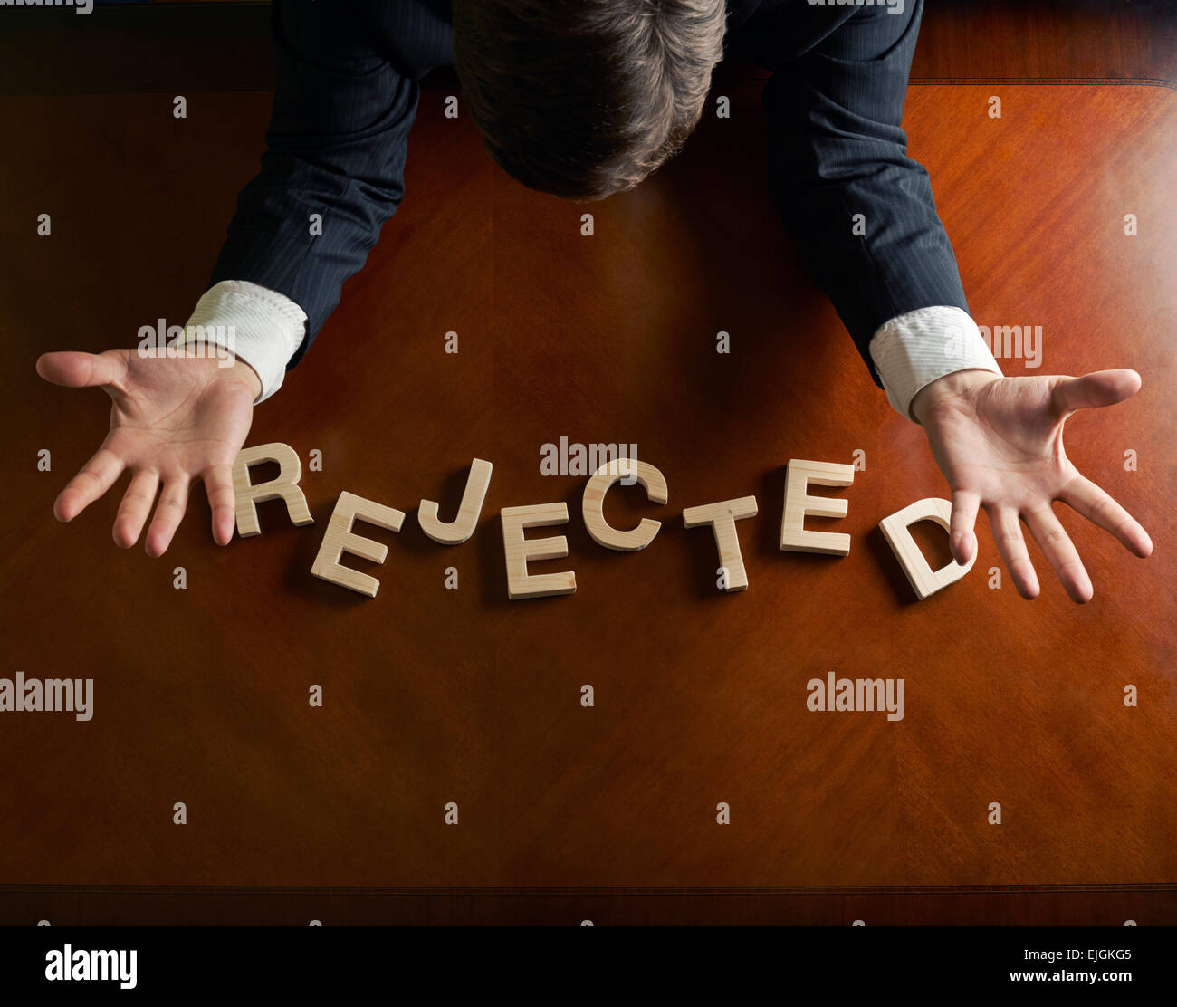 Word Rejected and devastated man composition Stock Photo - Alamy